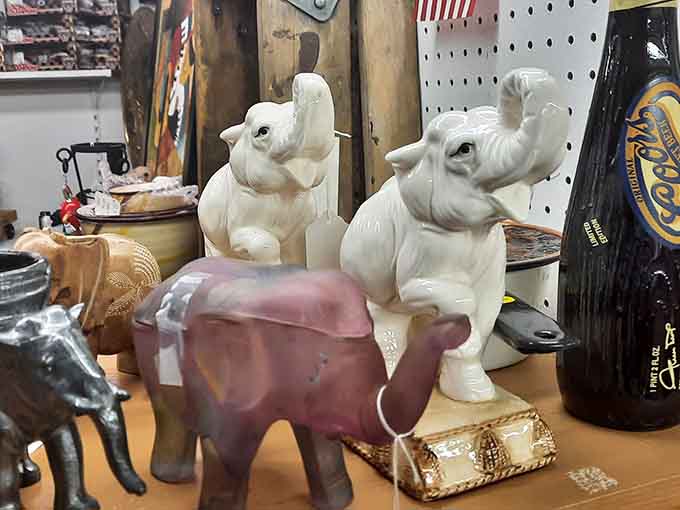 These charming elephant figurines stand guard with patient dignity, representing mid-century America's inexplicable but delightful obsession with pachyderm decor.