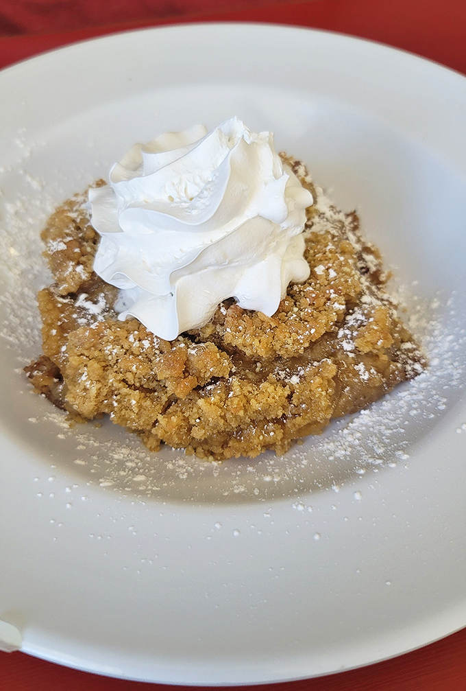 This apple crumble isn't just dessert masquerading as breakfast &ndash; it's comfort in a bowl, crowned with a cloud of whipped cream.