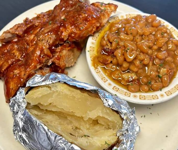 Fall-off-the-bone BBQ ribs paired with baked beans that have clearly been simmering to perfection &ndash; comfort food at its finest.