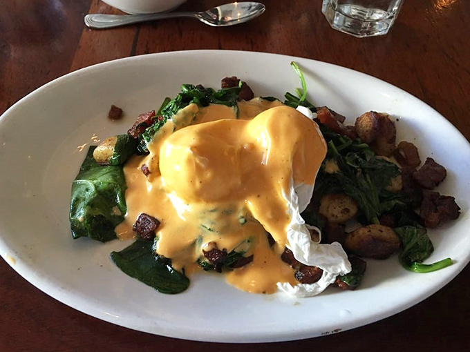 The moment of truth &ndash; when golden yolk meets hollandaise, creating a sauce so luxurious it should require a permission slip to consume.