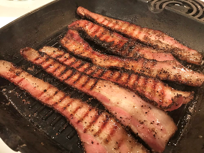 Bacon, bacon everywhere, and every bite a treat! These perfectly grilled strips are the Brad Pitt of pork &ndash; smokin' hot and universally adored.