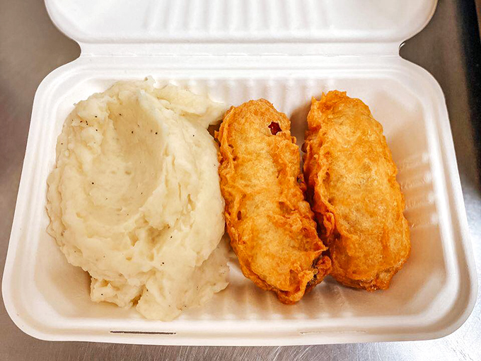The battered version of their famous bangers served alongside cloud-like mashed potatoes &ndash; comfort food that transcends international boundaries.