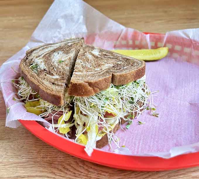 The Reuben on rye proves Beno's doesn't play favorites, giving equal love to all bread varieties while maintaining their legendary quality standards.