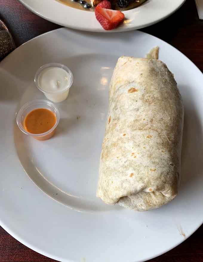 The Mucho Grande lives up to its name, arriving at your table like a delicious torpedo of breakfast perfection.