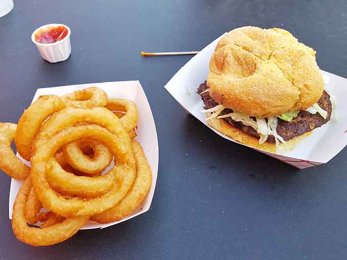 That burger paired with onion rings creates the kind of combo that makes you forget about your New Year's resolutions.