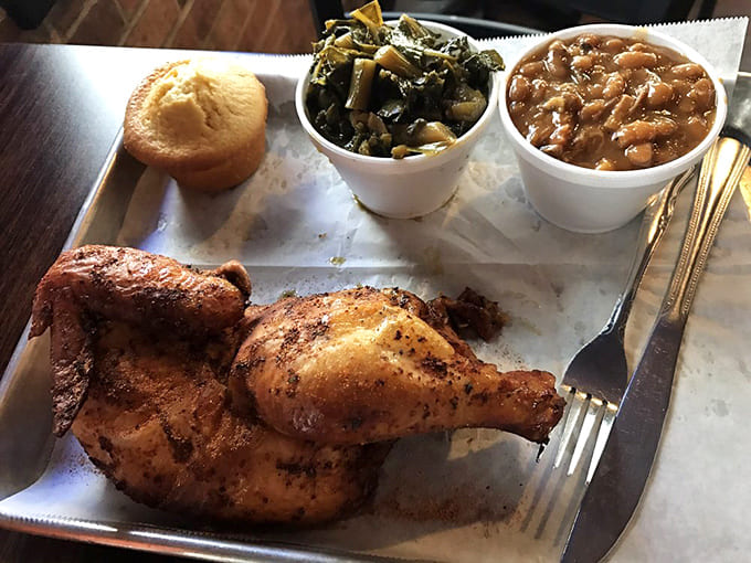 That golden-brown chicken with its perfectly cooked sides looks like Sunday dinner decided to get serious about smoke and flavor, and we're all benefiting.