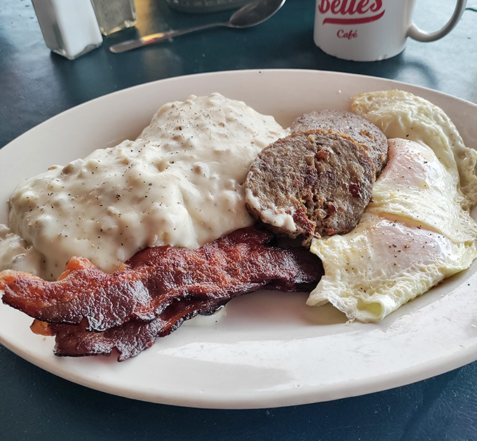 A breakfast fit for royalty &ndash; eggs, bacon, sausage and biscuits smothered in that legendary gravy, a plate that demands both respect and napkins.