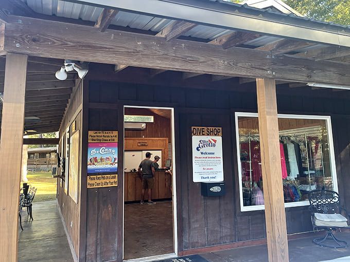 The dive shop entrance promises equipment and expertise, a humble facade hiding everything needed for underwater exploration.