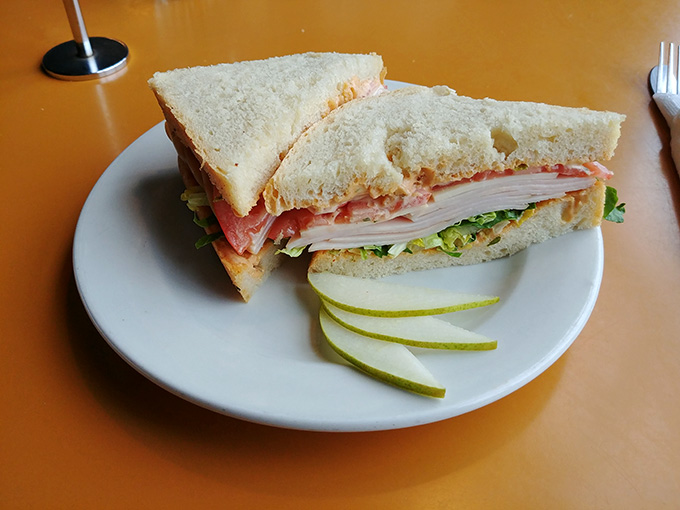 Fresh ingredients piled high between quality bread create the kind of sandwich that makes you understand why people drive from neighboring states.