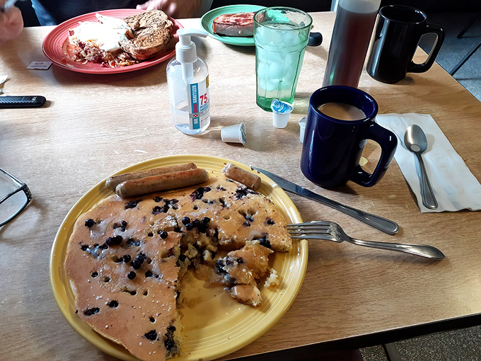 Breakfast harmony achieved: a blueberry pancake with those tiny wild Maine berries alongside sausage links with perfect snap.