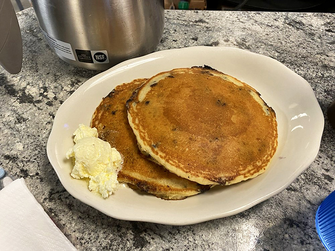 Pancake paradise: Golden, fluffy discs with a hint of Maine wild blueberries &ndash; breakfast doesn't get more authentically New England than this.