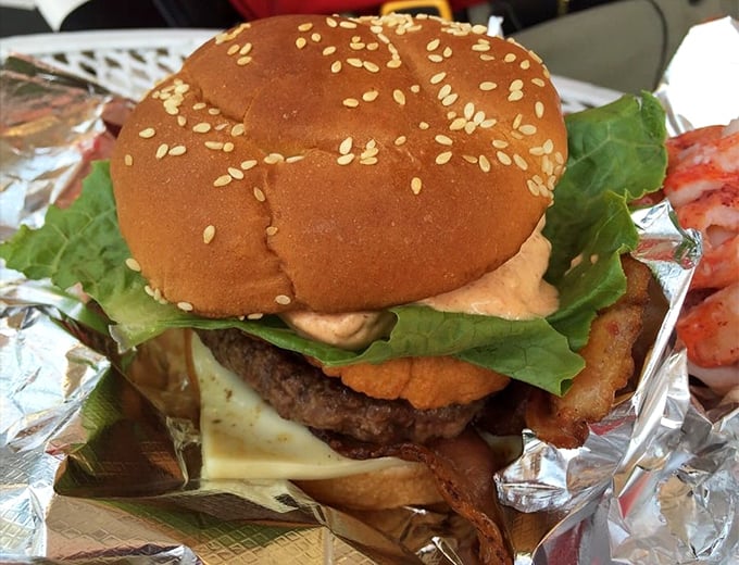 The burger that dares to compete with seafood royalty, topped with all the fixings on a perfectly toasted sesame seed bun.