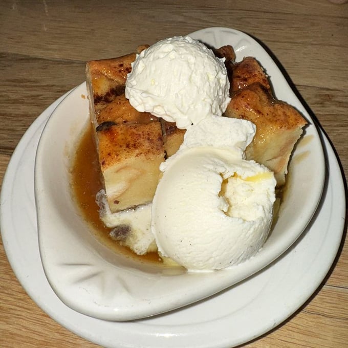 Bread pudding that would make your grandmother jealous, swimming in caramel sauce and crowned with melting ice cream.