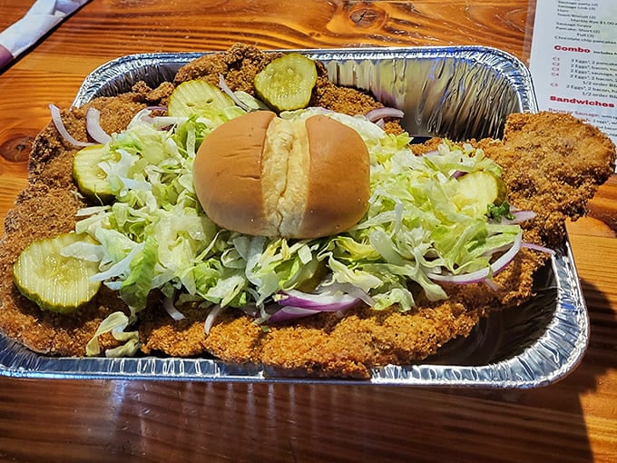 Garden-fresh toppings bring color and crunch to the tenderloin party, though they're clearly playing supporting roles.