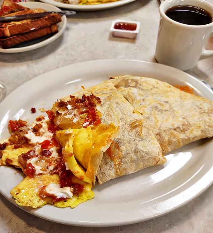 This breakfast burrito isn't just a meal, it's an engineering marvel &ndash; perfectly contained yet bursting with morning goodness.
