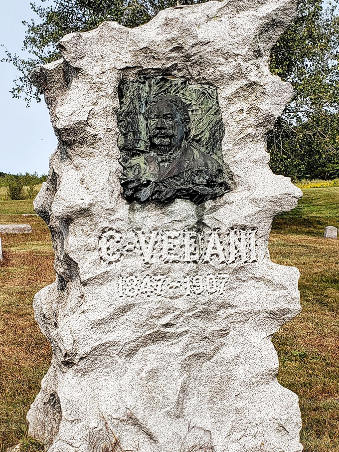 The Copeland memorial captures the stonecutter's remarkable skill, transforming cold granite into an expressive portrait.