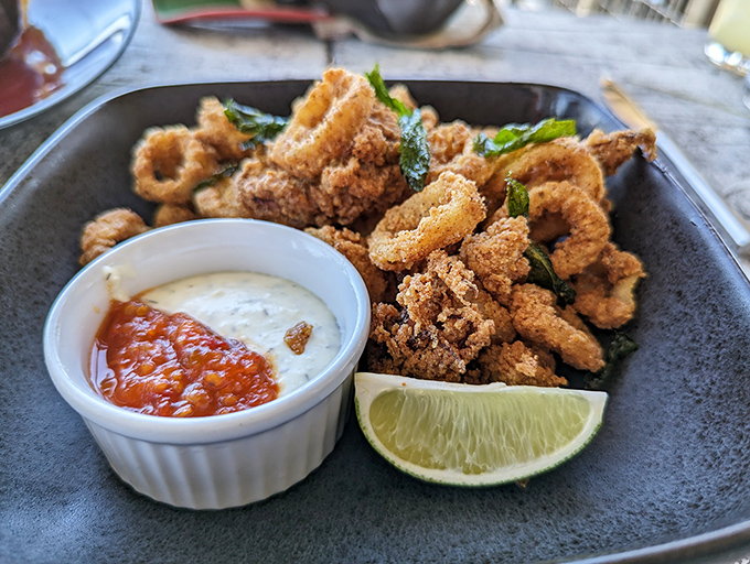 Crispy, golden rings of tender squid with just the right amount of crunch – the dipping sauces add zingy counterpoints to each bite.