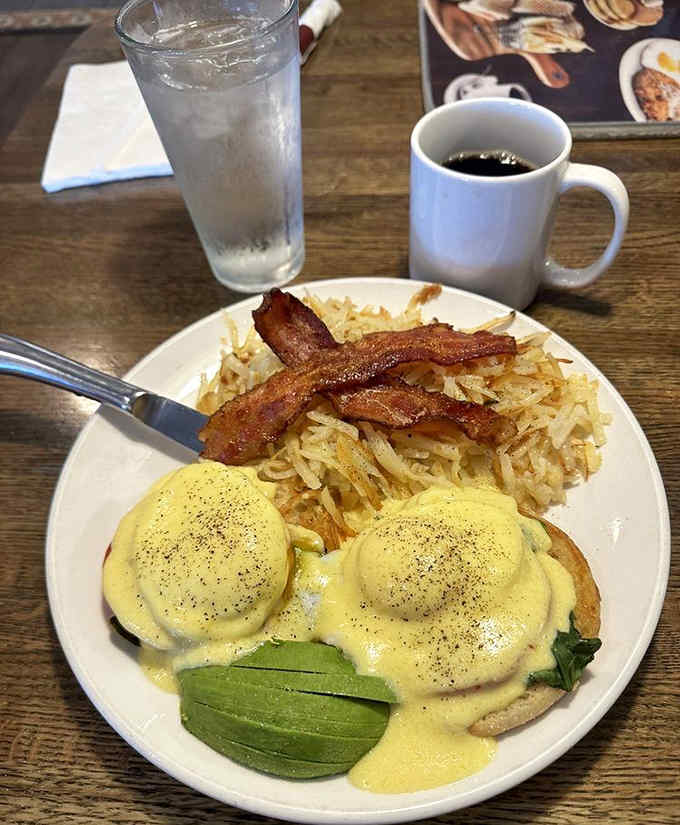 The California Benedict brings avocado, bacon, and hollandaise together in a combination that should probably be considered a controlled substance.