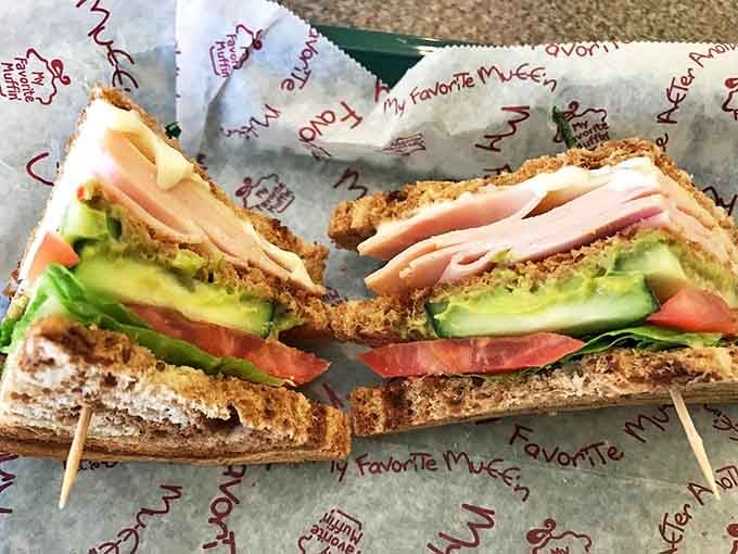 Layered like a work of art, the California Club sandwich showcases the kitchen's commitment to fresh ingredients and perfect proportions.