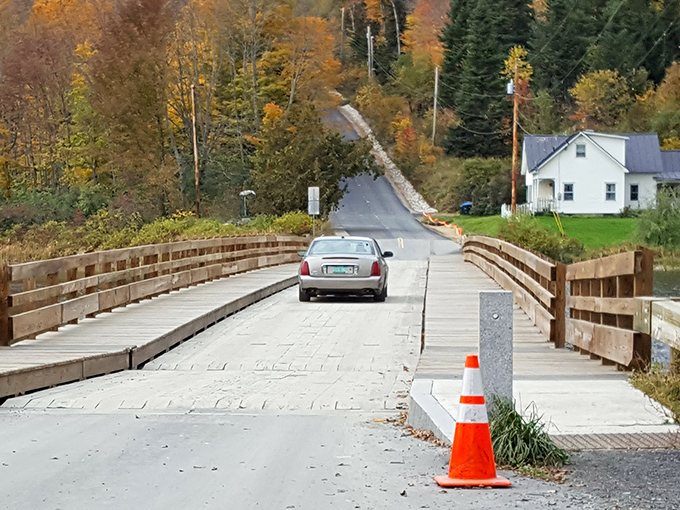 Cars rumble across wooden planks with a distinctive percussion, announcing their arrival to the lake's underwater residents.