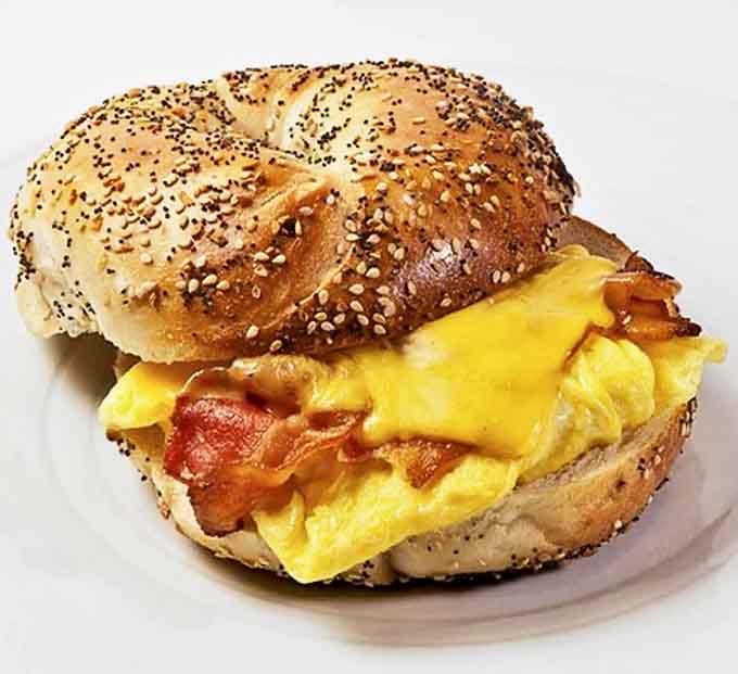 The everything bagel breakfast sandwich &ndash; where seeds, cheese, eggs and bacon create the perfect morning harmony.