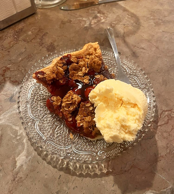 Cherry cobbler &agrave; la mode, where warm, bubbling fruit meets cold, creamy ice cream in a romance that's lasted generations.