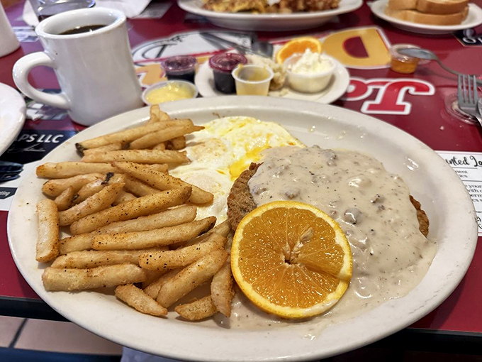 Chicken Fried Steak: Country comfort on a plate &ndash; crispy breaded steak swimming in peppery gravy that could make a grown person weep with joy.