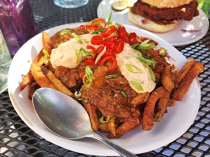 Comfort food royalty &ndash; crispy fries swimming in savory chili, topped with a pillowy egg. Hangover cure or celebration? Both.
