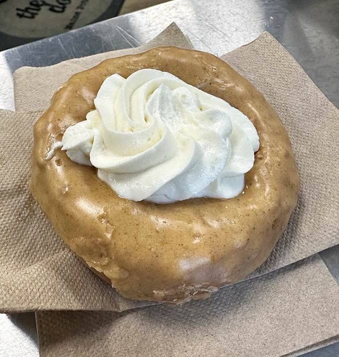 A cider Holy Cannoli with its perfect swirl of cream centers &ndash; like autumn decided to dress up fancy but still keep things cozy and approachable.