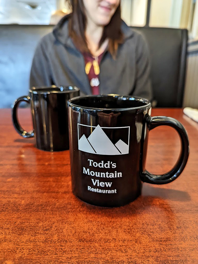 Forget mountains, here's a view worth waking up for! Todd's signature mug promises a caffeinated journey to flavor town.
