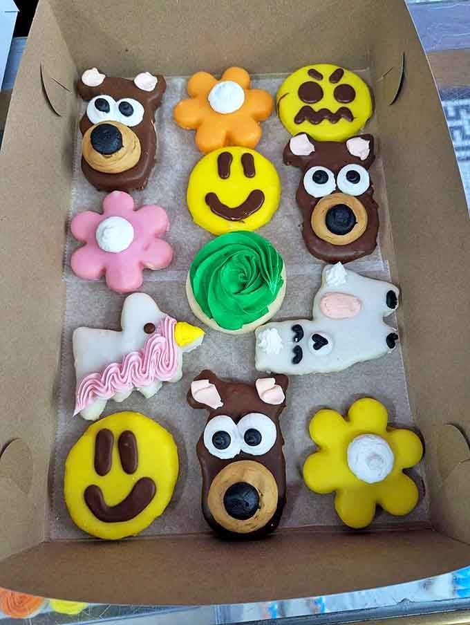 Colorful character cookies bring whimsy to the display case, proving Lindsey's creativity extends well beyond their famous donuts and fritters.