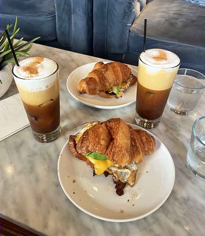 Golden croissants stuffed with eggs and melted cheese demonstrate why some people believe breakfast is the only meal that truly matters in life.