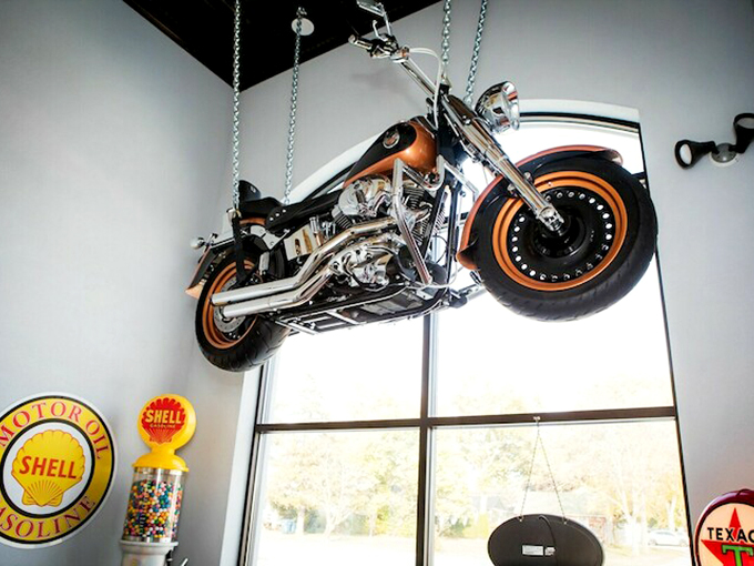 Is it a restaurant or a classic car show? With this motorcycle hanging from the ceiling, it's deliciously both!