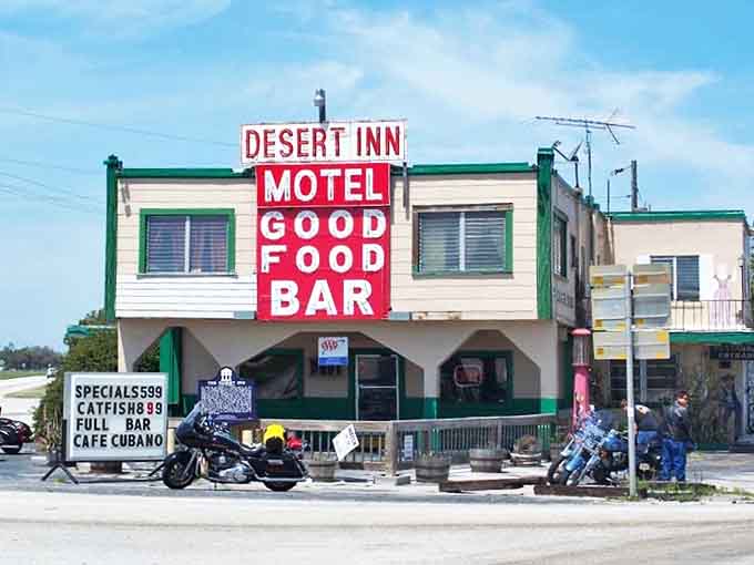 The Desert Inn's bold red signage promises the essentials of road trip happiness: a place to sleep, something good to eat, and a cold drink to wash it down.