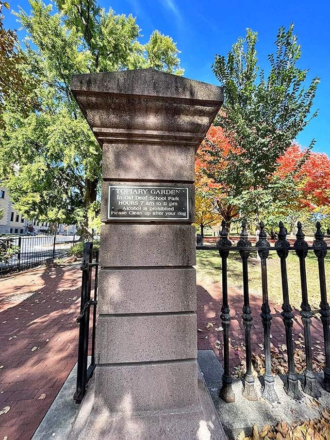 The entrance sign marks the threshold between ordinary park and extraordinary artistic experience. Leave reality at the gate.