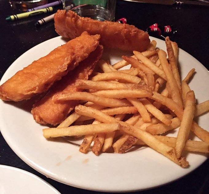 Golden-battered fish and perfectly crisp fries – the kind that make you wonder how a mountain restaurant masters coastal cuisine so brilliantly.
