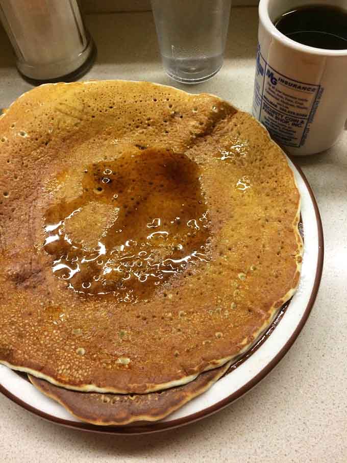 Even the short stack at Frieda's understands that "short" is a relative term when you're dealing with pancakes this good and this generous.