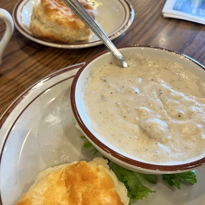 Behold: the full biscuits and gravy experience &ndash; a mountain of comfort food that's worth every delicious calorie.