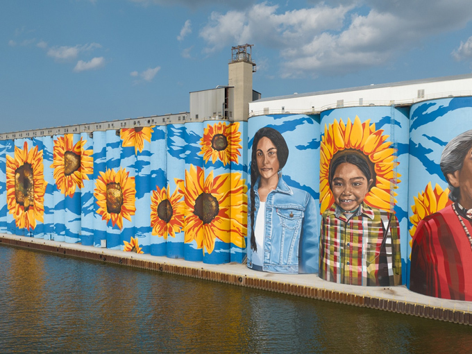 The portraits feature remarkable detail and expression, honoring the indigenous people who first called this region home with dignity and respect.