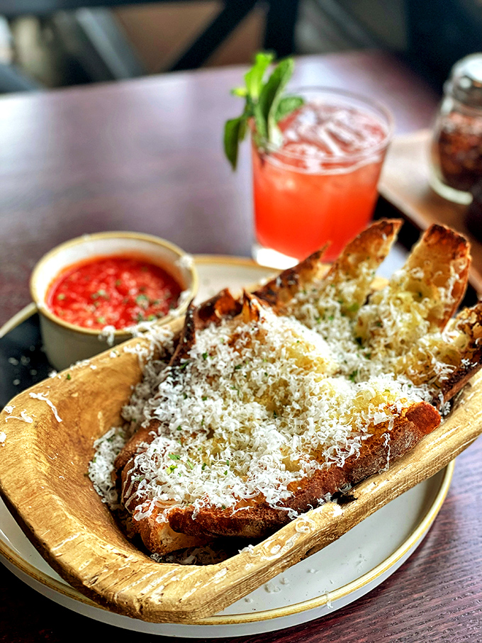 Garlic Parmesan Bread: Crusty bread transformed into a garlic-butter-parmesan vehicle that makes you forget all about your carb concerns. Worth it!