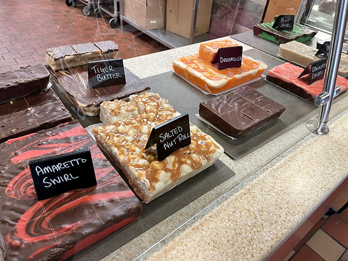 Handcrafted fudge squares tempt with swirls of tiger butter and amaretto, each one a sweet souvenir of Minnesota.