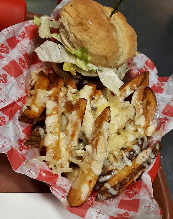 Mushroom-smothered fries prove that vegetables count when they're buried under cheese and fungi.