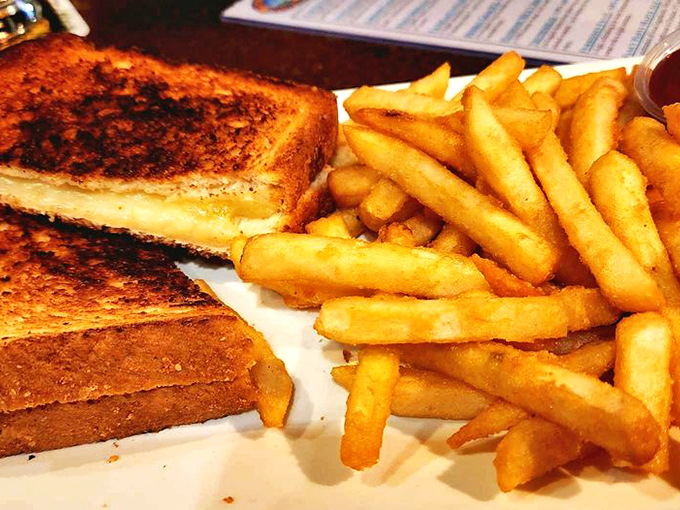 The perfect grilled cheese doesn't exi&mdash; wait, it does! Golden, crispy exterior hiding molten cheese, paired with hand-cut fries.