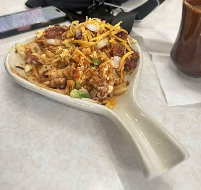 This chili skillet brings the heat and the heartiness, piled high with cheese and everything good in life, served sizzling hot.