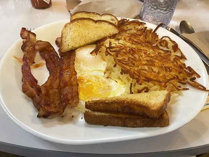 Crispy bacon and perfectly cooked hash browns demonstrate why breakfast is the most important meal and the most delicious.
