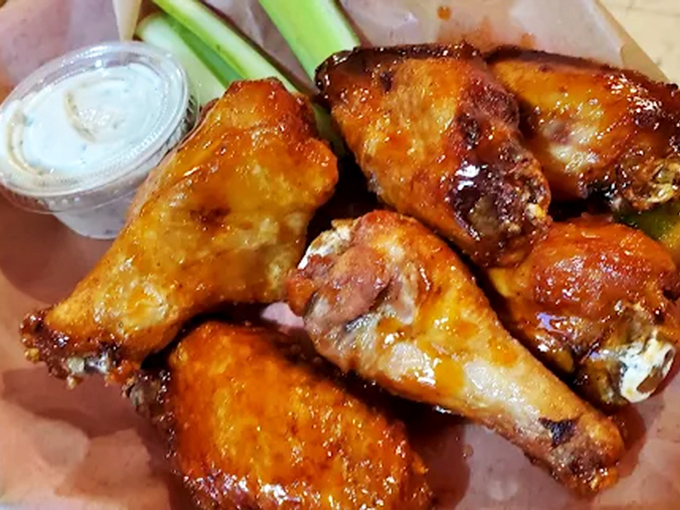 These wings aren't just fried&mdash;they're smoked first, creating a flavor depth that'll make ordinary wings seem like distant, forgettable relatives.
