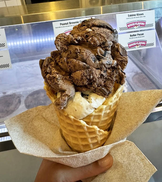 Chocolate perfection in cone form – this towering scoop of brownie-studded goodness is worth every calorie and potential brain freeze.