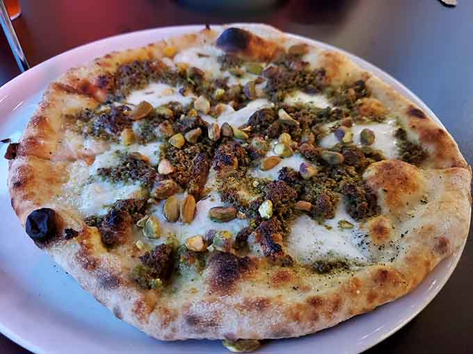 The pistachio pizza shows Pizza Napoli isn't afraid to get creative, bringing unexpected flavors that somehow make perfect sense together.