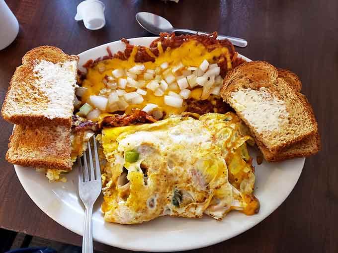This breakfast platter is what happens when a restaurant understands that portion control is for amateurs and happiness comes in generous servings.