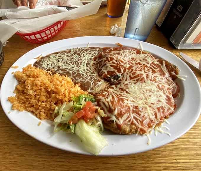 A closer look reveals the generous cheese filling and perfectly roasted poblano pepper that make this dish legendary among Flagstaff food lovers.